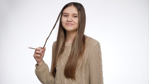 Smiling Young Teenage Girl Twisting Long Stock Footage Video (100% ...