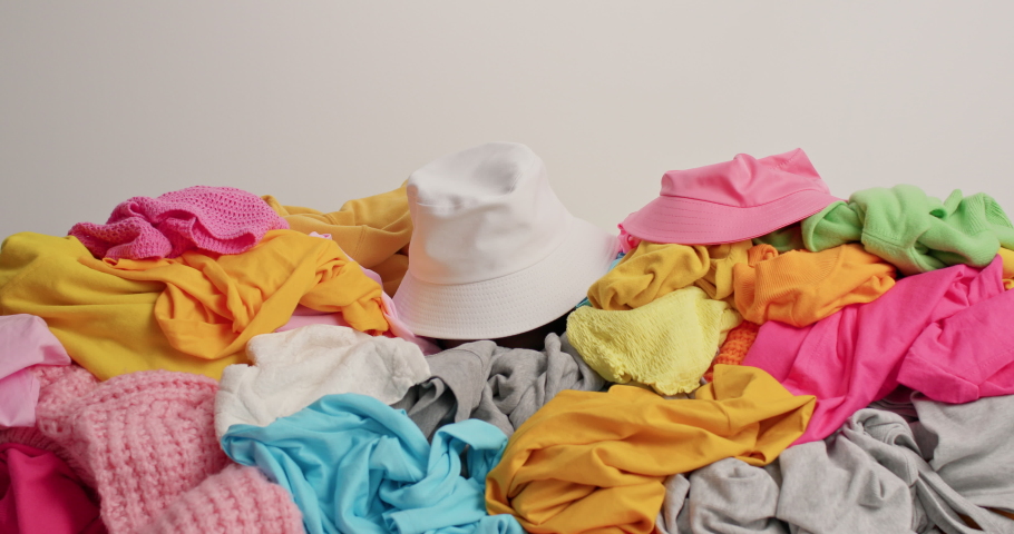 Carrying pile clothes Stock Video Footage - 4K and HD Video Clips ...