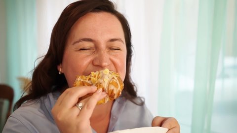 Woman Eats Croissant Junk Food Weight Stock Footage Video (100% Royalty ...