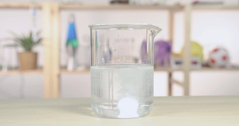Dissolving Antacid Tablet Into Beaker Water Stock Footage Video (100% ...