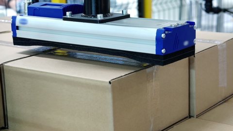 Mechanical Manipulator Stacks Cardboard Boxes Stock Footage Video (100% ...