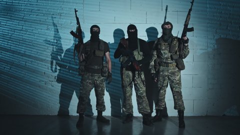 Portrait Dollyin Shot Three Armed Terrorists Stock Footage Video (100% ...