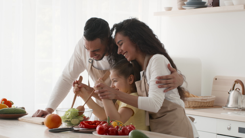 happy middle-eastern family three cooking together Stock Footage Video ...
