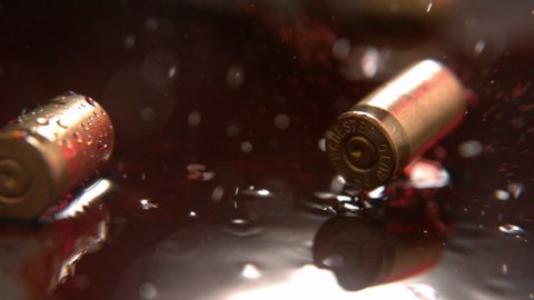 Bullet Casing Falling Wet Ground Crime Stock Footage Video (100% ...