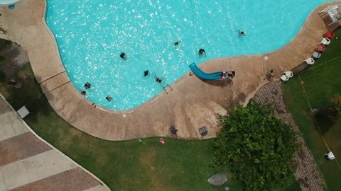 People On Water Pool Slide Cenital Stock Footage Video (100% Royalty ...
