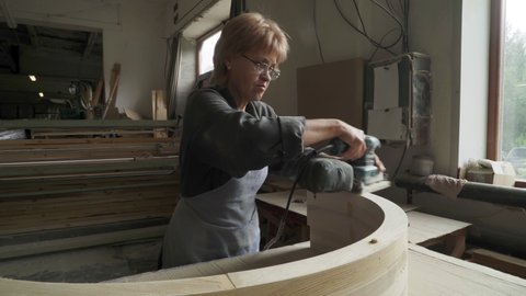 Female Laborer Using Tool Processing Wood Stock Footage Video (100% ...