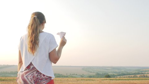 Young Woman Running Paper Airplane Field Stock Footage Video (100% ...