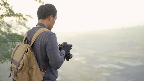 Man Photographer Backpack Camera Captures Moment Stock Footage Video ...