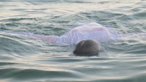 Body Drowned Man Floats On Water Stock Footage Video (100% Royalty-free ...