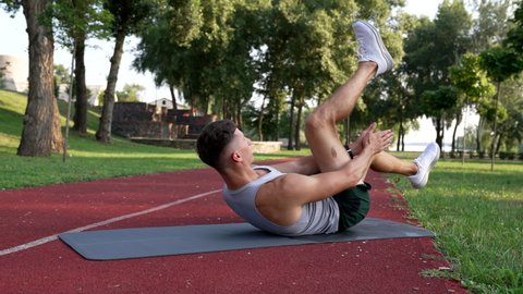Sportsman Crunch Clapping On Fitness Mat Stock Footage Video (100% ...
