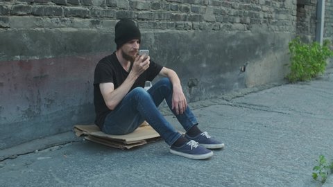Homeless Man Sitting On Cardboard Box Stock Footage Video (100% Royalty ...