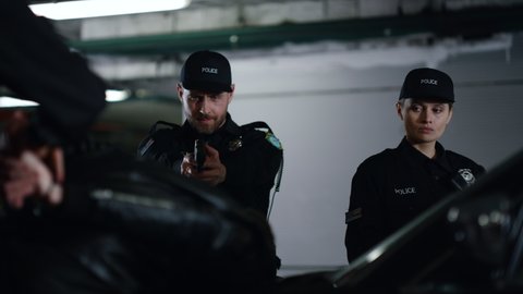 Police Officers Arresting Criminal Underground Parking Stock Footage ...