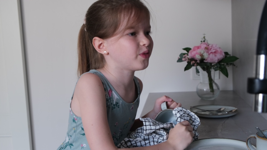 Little Girl Wiping Dishes After Stock Footage Video (100% Royalty-free ...