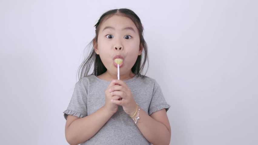 Little girls with suckers Stock Video Footage - 4K and HD Video Clips ...