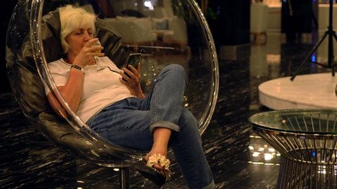 Woman Relaxing Comfortable Modern Perspex Armchair Stock Footage Video ...