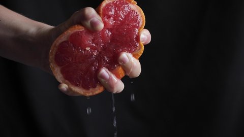 Hand squeezing fruit Stock Video Footage - 4K and HD Video Clips ...