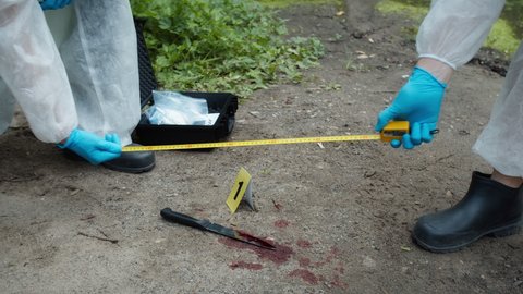 Criminalists Discovering Knife Crime Scene Measuring Stock Footage ...