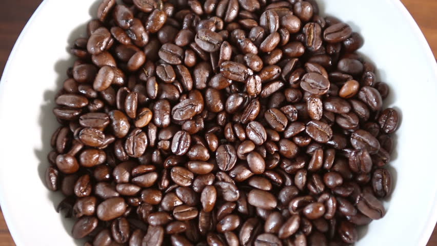 delicious fresh coffee beans pouring above Stock Footage Video (100% ...