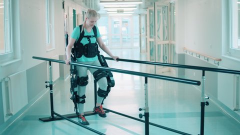 Young Woman Using Exosuit Walking Hospital Stock Footage Video (100% ...