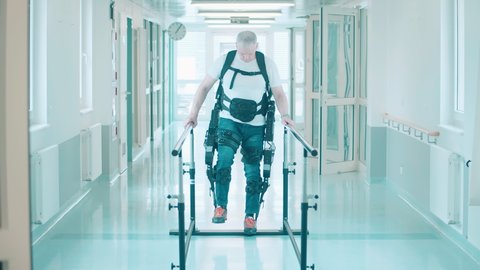 Man Using Exosuit Practice Walking Hospital Stock Footage Video (100% ...