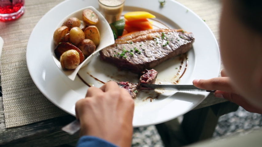 Kids eating steak Stock Video Footage - 4K and HD Video Clips ...