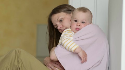 Mom Rocking Her Baby Before Going Stock Footage Video (100% Royalty ...