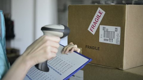 Barcode scanning warehouse Stock Video Footage - 4K and HD Video Clips ...