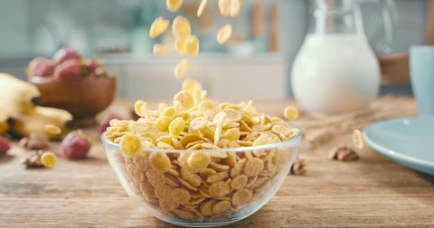 Sweet Crusty Corn Flakes Falling Into Stock Footage Video (100% Royalty ...
