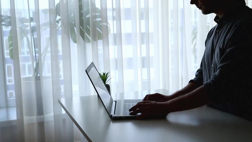 young man working on laptop finish Stock Footage Video (100% Royalty ...