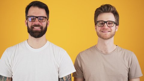 Two Positive Guys Wearing Eyeglasses Nodding Stock Footage Video (100% ...
