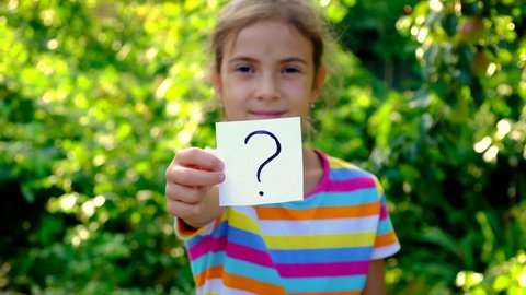 Children Shows Question Mark On Paper Stock Footage Video (100% Royalty ...