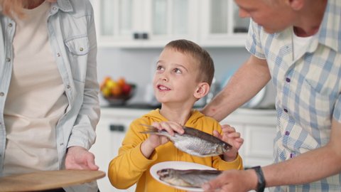 Boy eating fish Stock Video Footage - 4K and HD Video Clips | Shutterstock