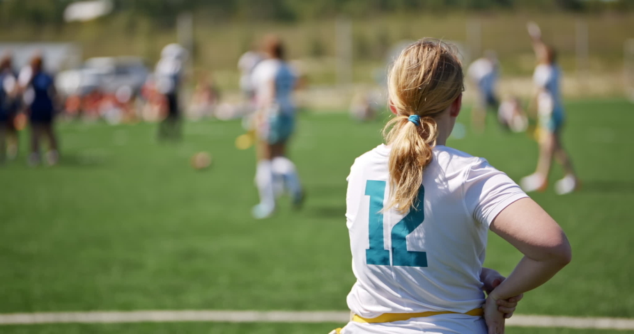 Girl start flags Stock Video Footage - 4K and HD Video Clips | Shutterstock