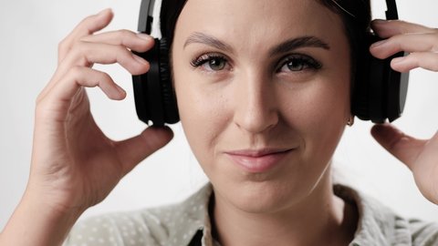 Woman Takes Off Her Headphones Smiling Stock Footage Video (100% ...