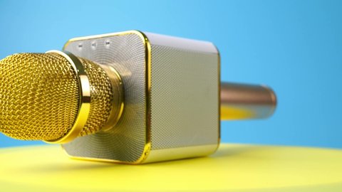 Golden Mic Rotate On Surface Blue Stock Footage Video (100% Royalty ...