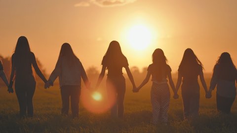 Group Girls Walk Towards Sun Sunset Stock Footage Video (100% Royalty ...