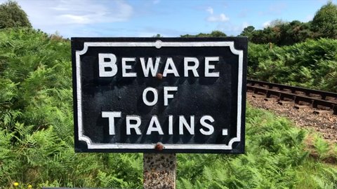 Beware Trains Sign By Railway Train Stock Footage Video (100% Royalty ...