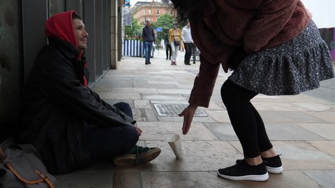 Man begging woman Stock Video Footage - 4K and HD Video Clips ...