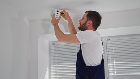 Security Office Happy Man Installs Hidden Stock Footage Video (100% ...