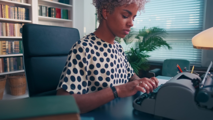 In the office working man concentrated typing some notes on the ...
