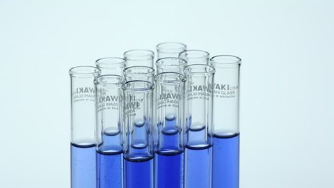 Pouring Blue Solution Test Tubes Lab Stock Footage Video (100% Royalty ...