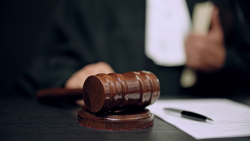 judge hand hitting hammer three times Stock Footage Video (100% Royalty ...