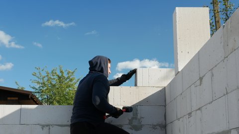 Man Construction Site Man Builds House Stock Footage Video (100% ...