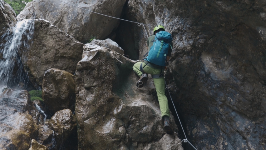 Man Traversing Via Ferrata. Static, Stock Footage Video (100% Royalty ... Man Traversing Via Ferrata. Static, Stock Footage Video (100% Royalty ...