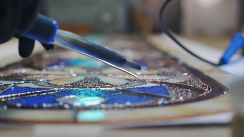 close-up soldering stained glass seams artist's Stock Footage Video ...