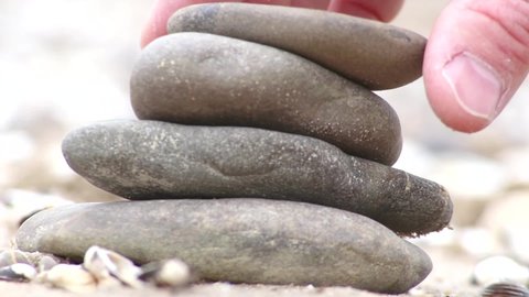 European Male Hand Building Stone Stack Stock Footage Video (100% ...