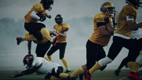 College football player Stock Video Footage - 4K and HD Video Clips ...