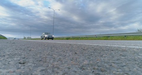 Cars Drive Past Camera On Highway Stock Footage Video (100% Royalty ...