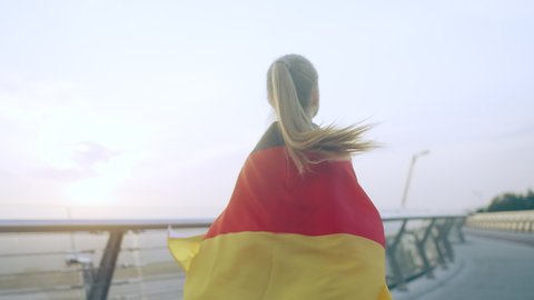 Girl with racing flag Stock Video Footage - 4K and HD Video Clips ...