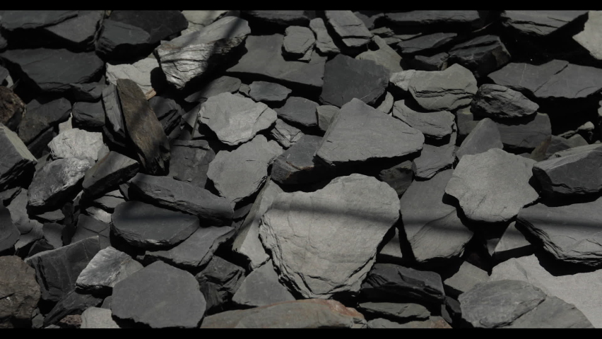 black decorative garden stones - pebbles Stock Footage Video (100% ...